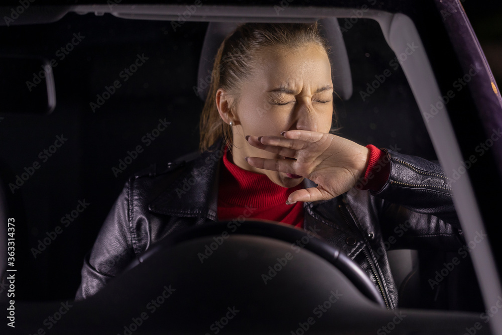 Sleeping woman sits inside car, tired female driver yawns falls asleep ...