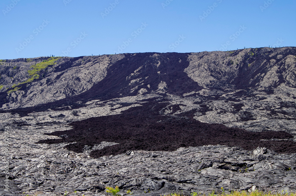 Lava flow as solid black rock after volcano eruption in Volcanoes ...