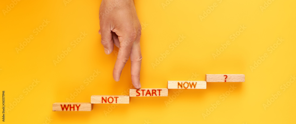 why not start now concept. male hand steps on stairs with inscriptions ...