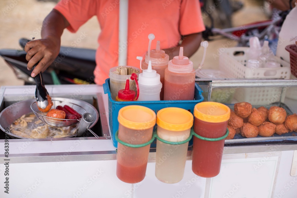 philippine street food tempura and fishballs on a side car market stall ...