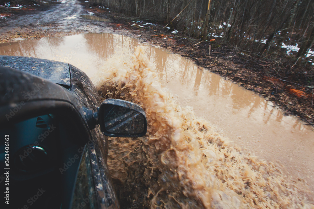 Suv offroad 4wd car rides through muddy puddle, off-road track road ...