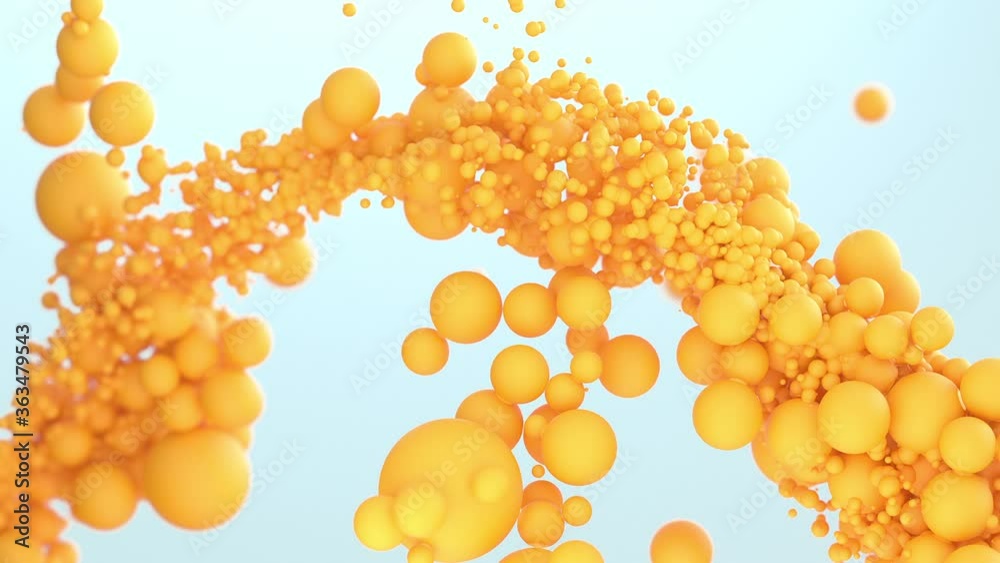 A stream of yellow balls of different diameters, abstract drops of ...