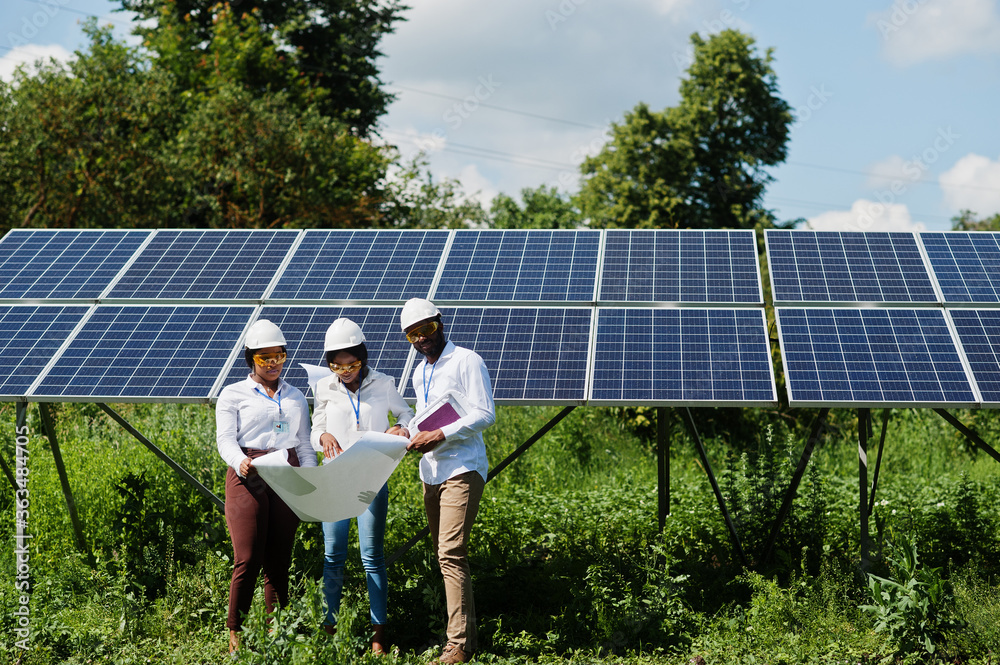 African american technician checks the maintenance of the solar panels ...