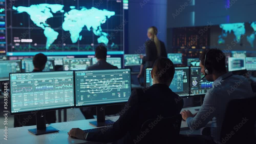 Team of Professional Computer Data Science Engineers Work on Desktops ...