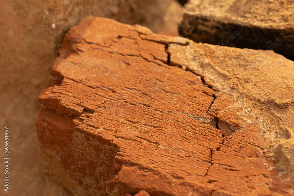 Chipped clay red brick. Cracked clay brick. Old cracked clay brick ...