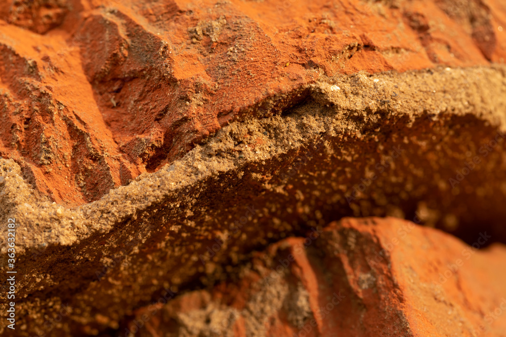 Chipped clay red brick. Cracked clay brick. Old cracked clay brick ...