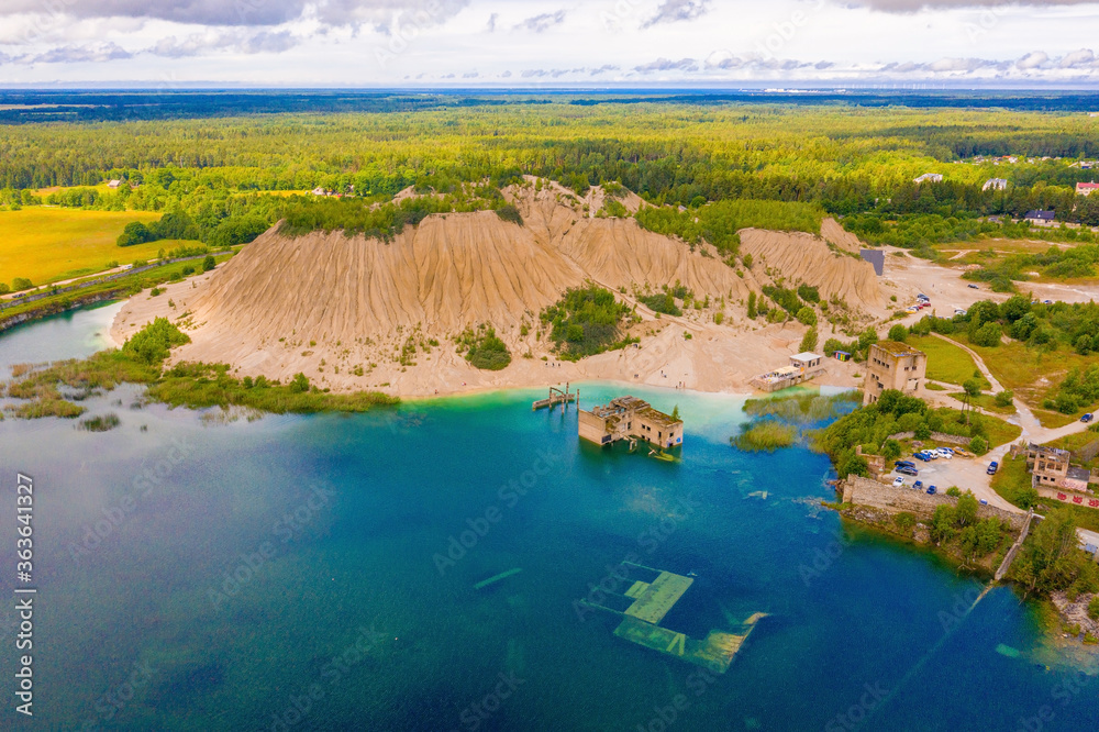 Aerial view of the Rummu abandoned prison Tallinn Estonia lake beach ...