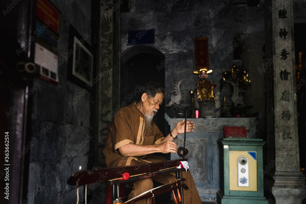 Monk Inside A Temple In Vietnam Stock Photo | Adobe Stock