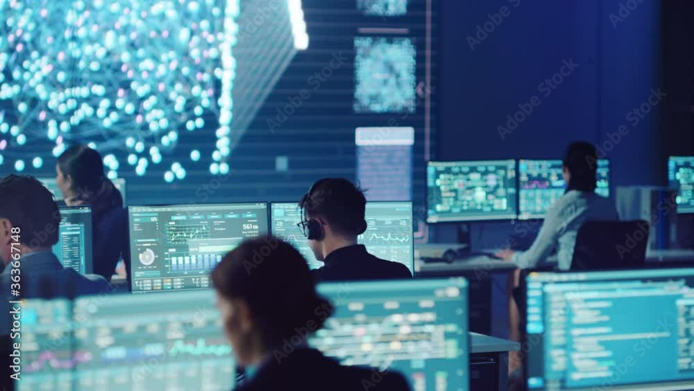 Team of Professional Computer Data Science Engineers Work on Desktops ...