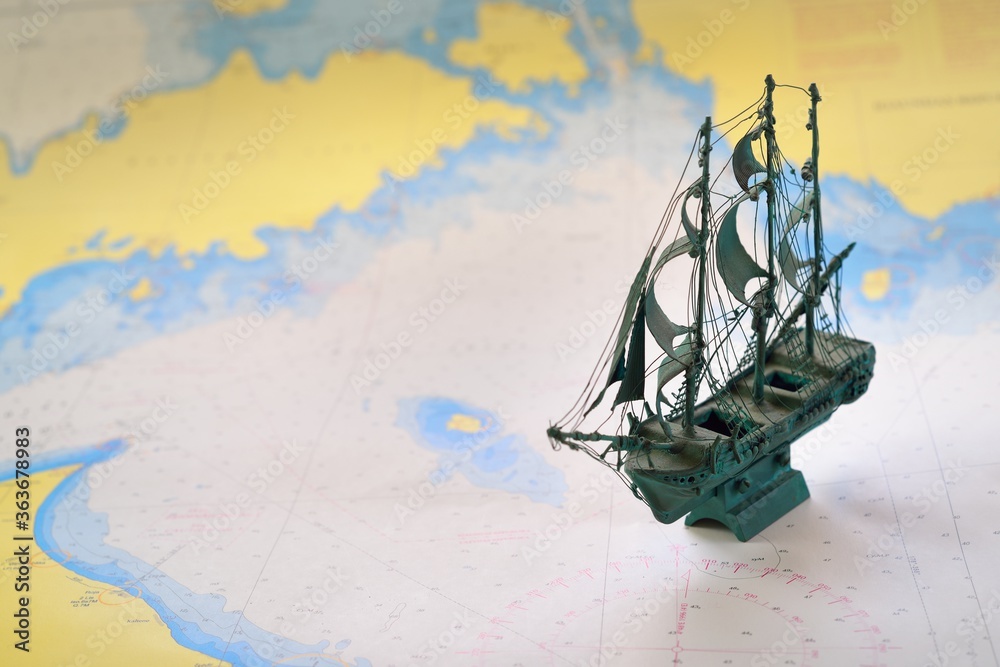 Vintage scale model of the historical tall ship and old white nautical ...