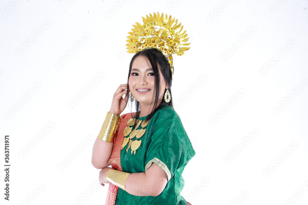 Beautiful smiling Asian girl wearing a set of modern traditional ...