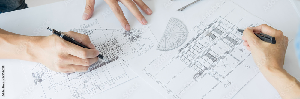Engineer of architect starting draw a house blueprint on the desk in ...