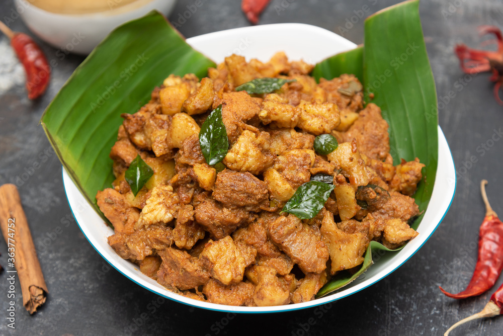 Beef fry curry roast mutton curry meat dish Kerala, India. Hot and ...