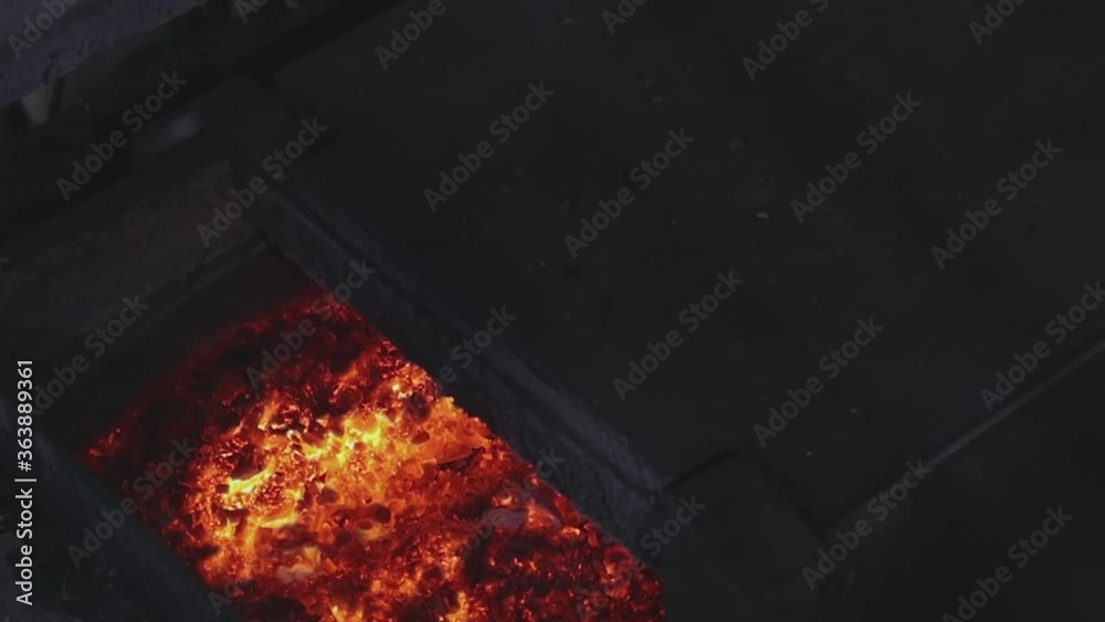 The furnace with molten metal, the melting of copper in the furnace ...