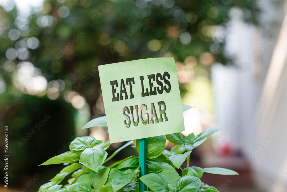 Handwriting text writing Eat Less Sugar. Conceptual photo reducing ...