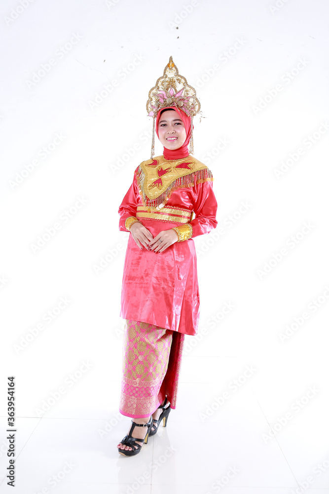 Beautiful smiling Asian girl wearing a set of modern traditional ...