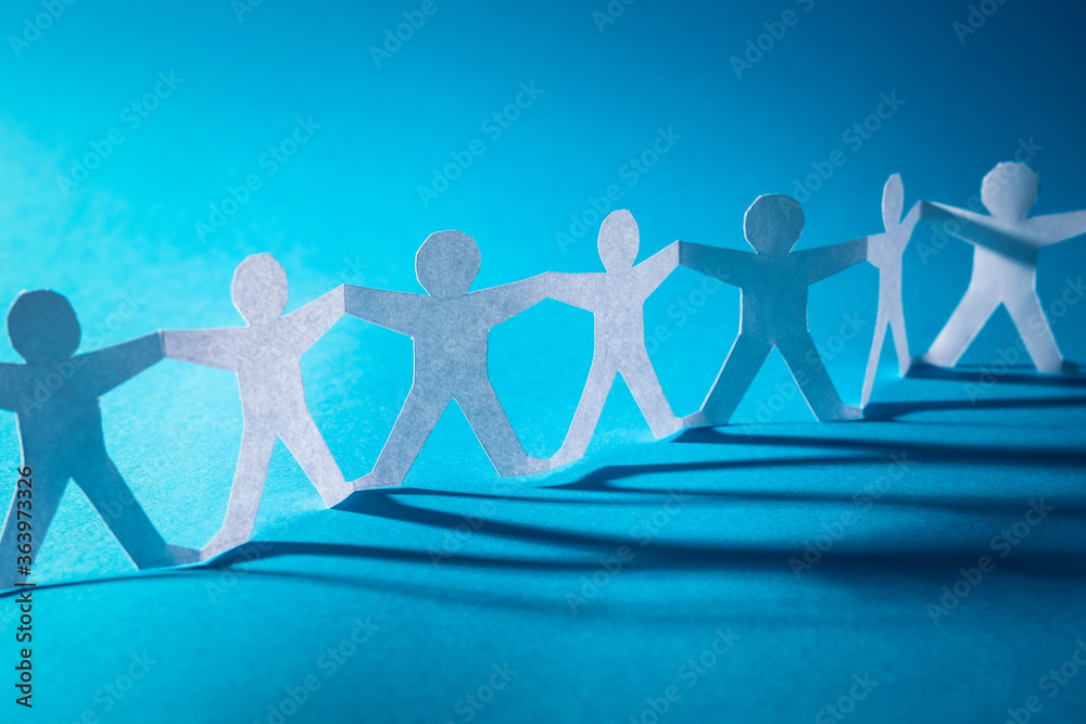 Human team of paper chain people. Stock Photo | Adobe Stock