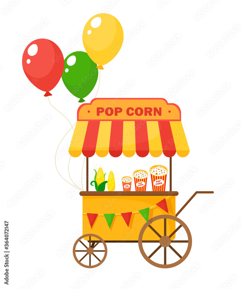 Cart with popcorn and corn. Festive decor with flags and balloons ...