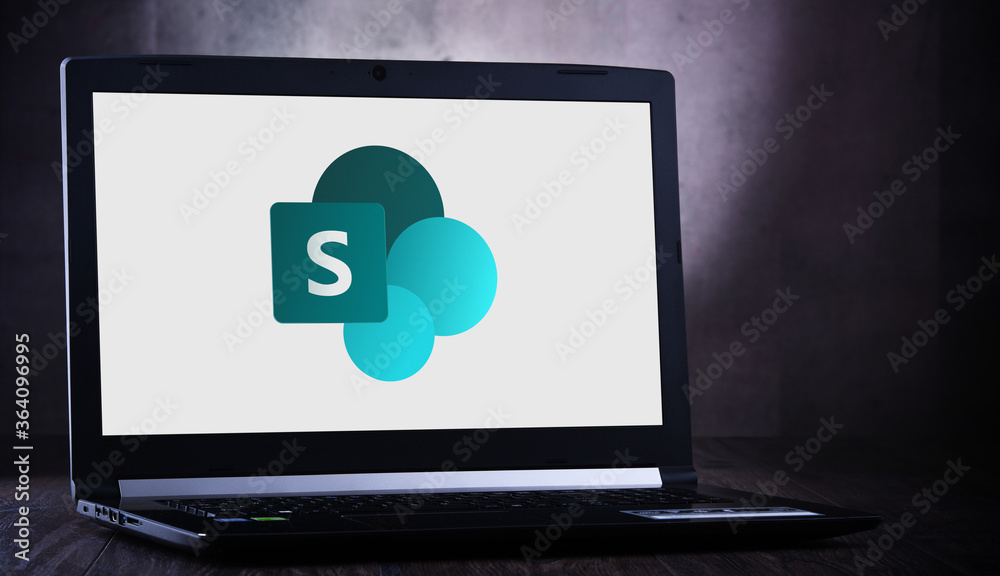 Laptop computer displaying logo of SharePoint Stock Photo | Adobe Stock