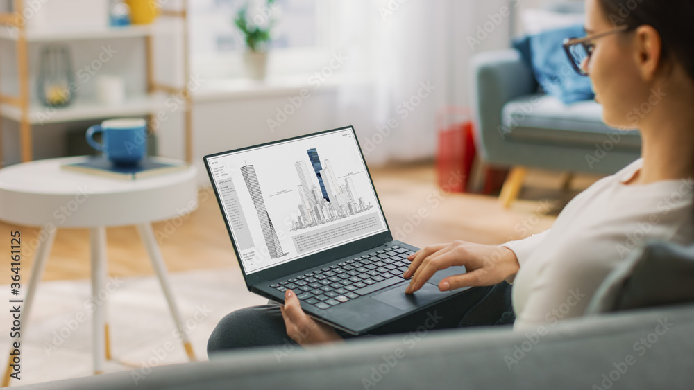 Young Talented Woman Architect is Sitting at Home on a Couch Working ...