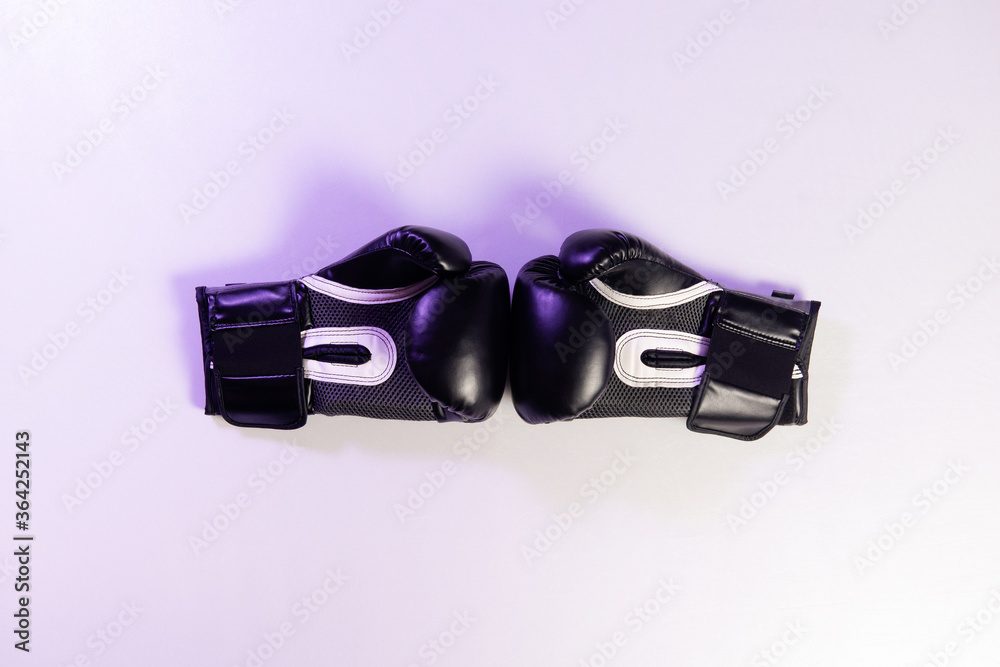 Black boxing gloves arranged horizontally on a white background Stock ...