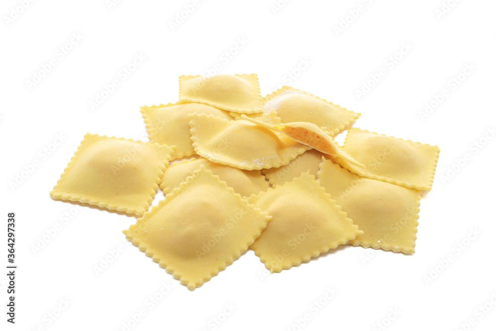 Classic uncooked ravioli pasta with pumpkins topping isolated on a ...
