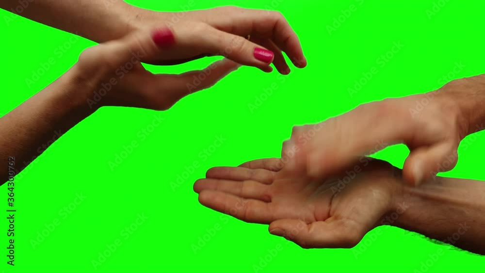 Hands are clapping on green screen background. Female and male hands ...