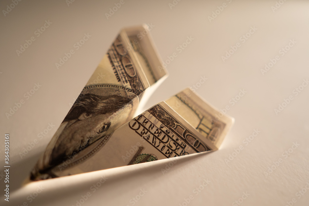 A fall. Fallen plane from a dollar bill. The plane is composed of one ...
