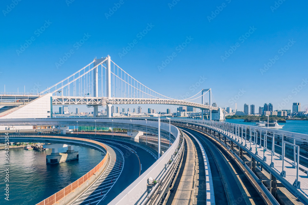 Transport system of Japan. Railway and road bridges in Tokyo. Rainbow ...