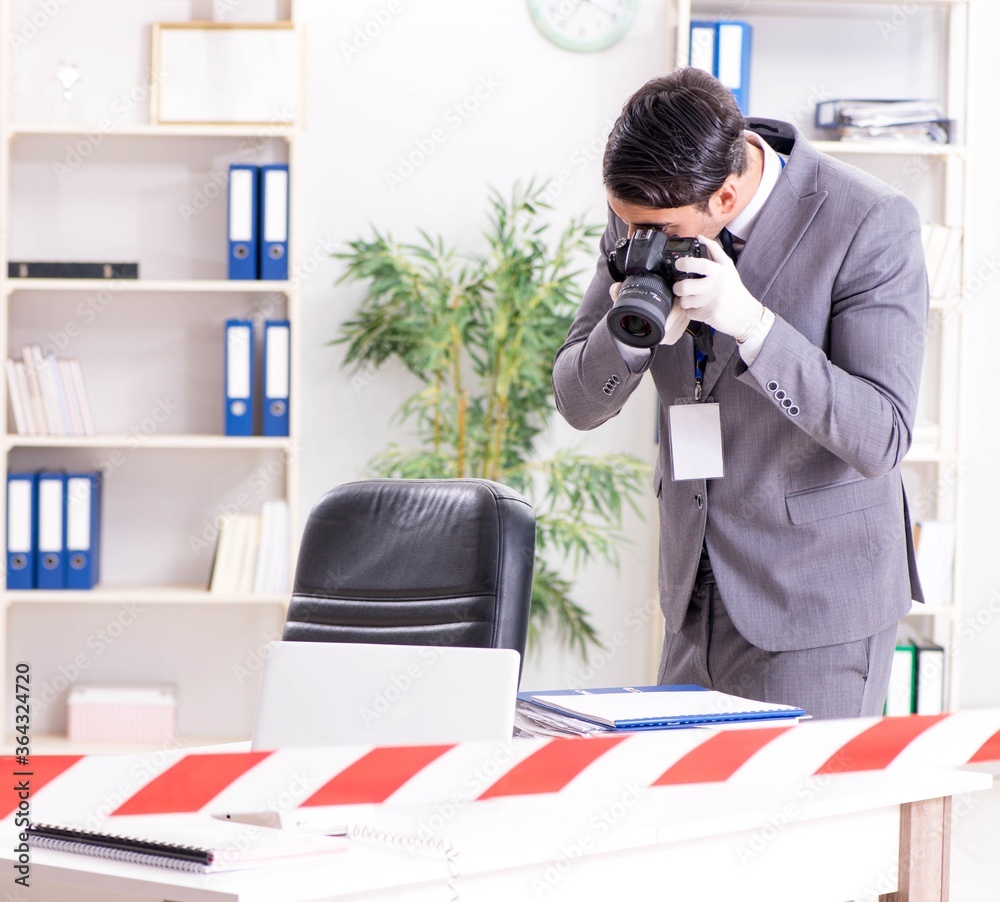 Forensics investigator at the scene of office crime Stock Photo | Adobe ...