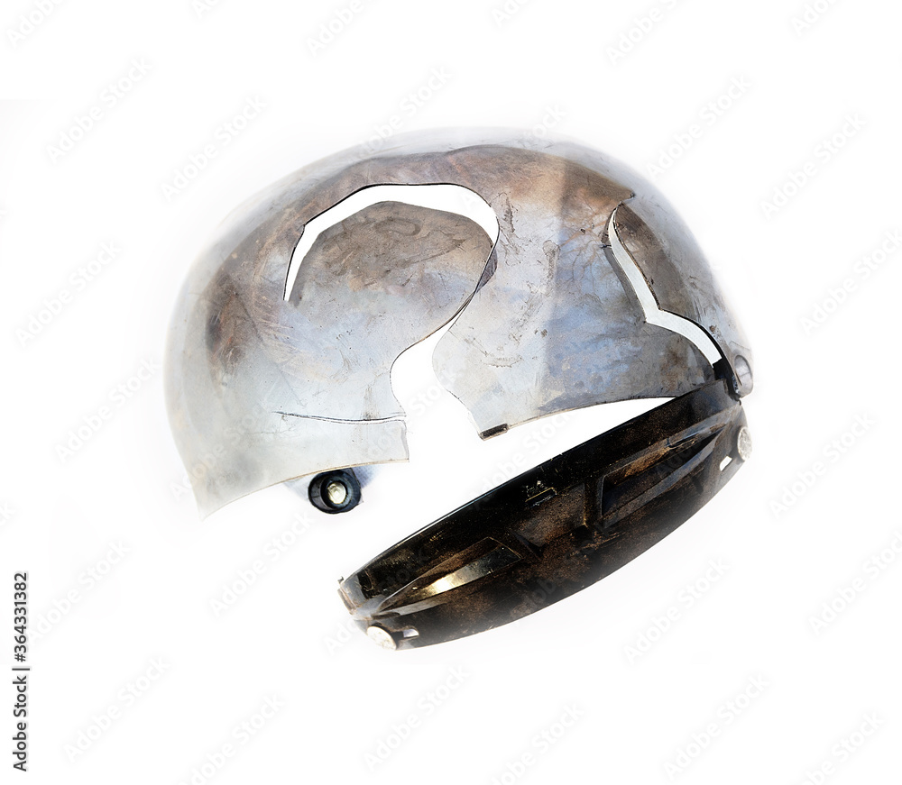 Broken helmet after accident on a white background. Safety and road ...
