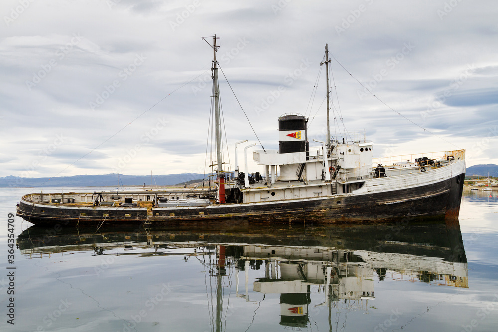 The wreck of the Saint Christopher aground in the harbor of Ushuaia ...
