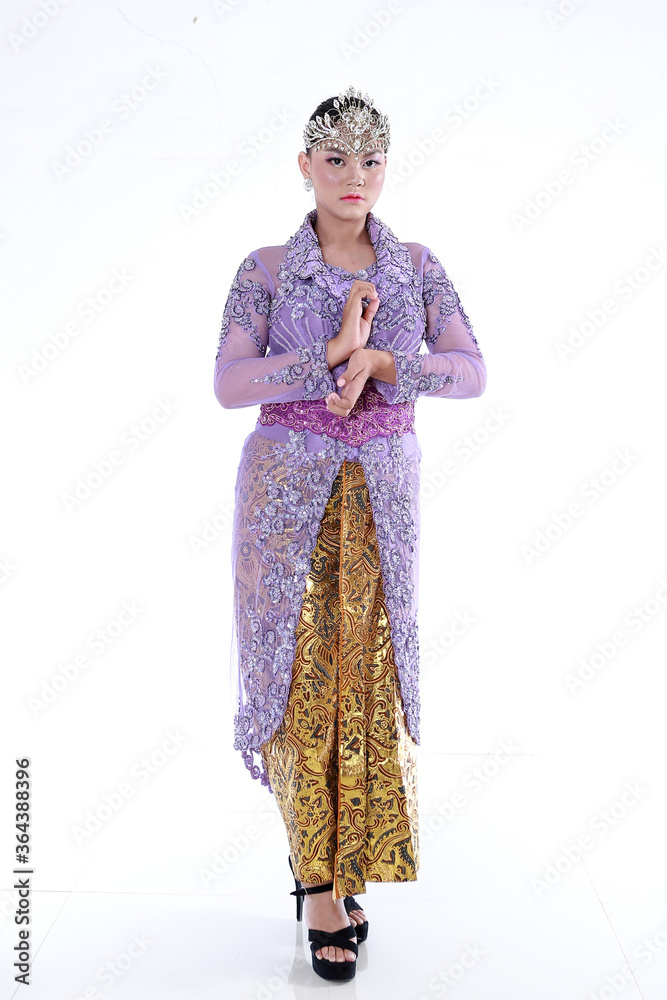 Beautiful smiling Asian girl wearing a set of modern traditional ...