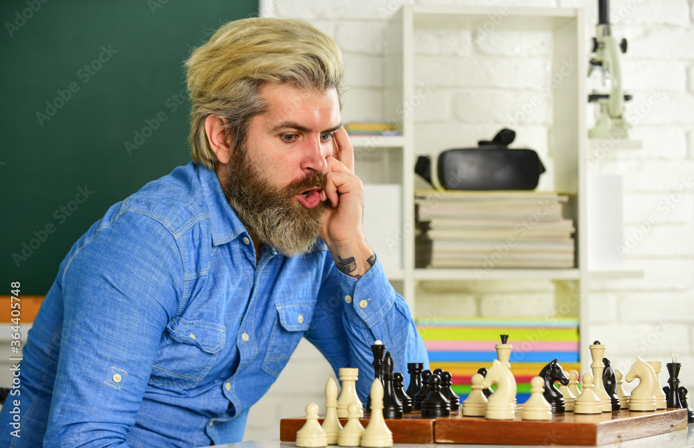 usefulness of chess. mature man playing intellectual game. clever man ...