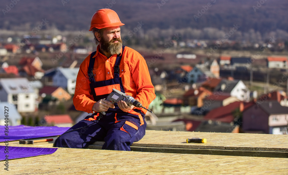 Roofer constructing roof. Man roofing surface. Materials requirements ...