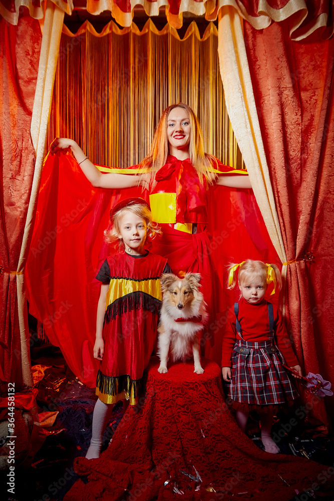Family with dog during stylized theatrical circus photo shoot in ...