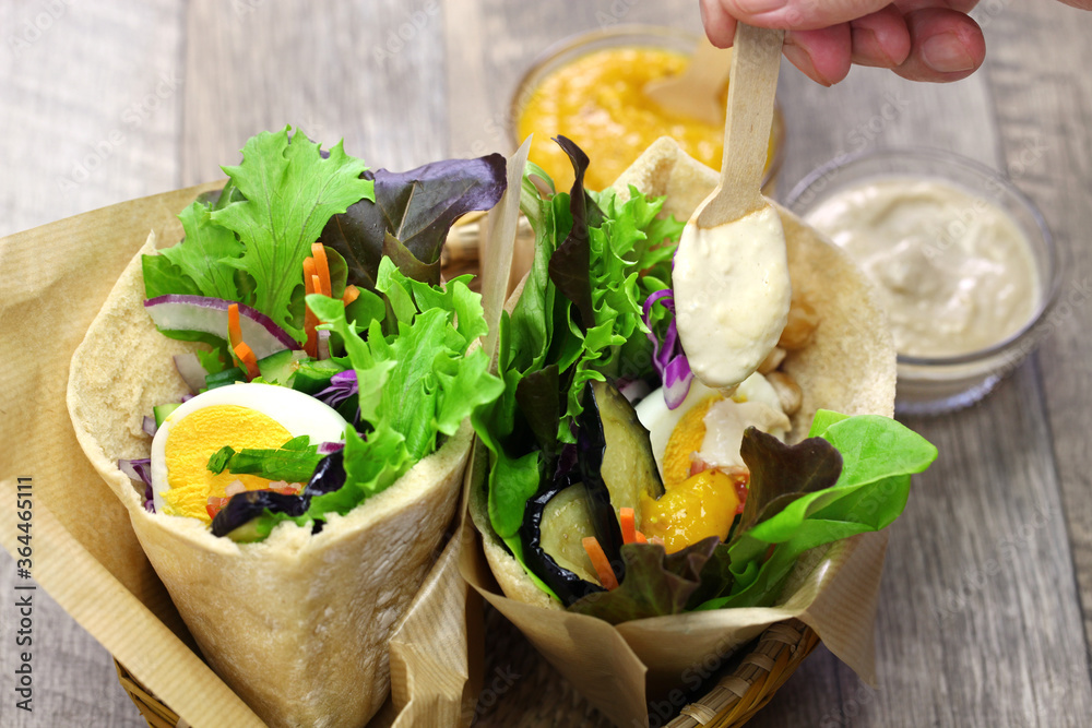 sabich: israeli pita sandwich with fried eggplant, hard boiled egg ...
