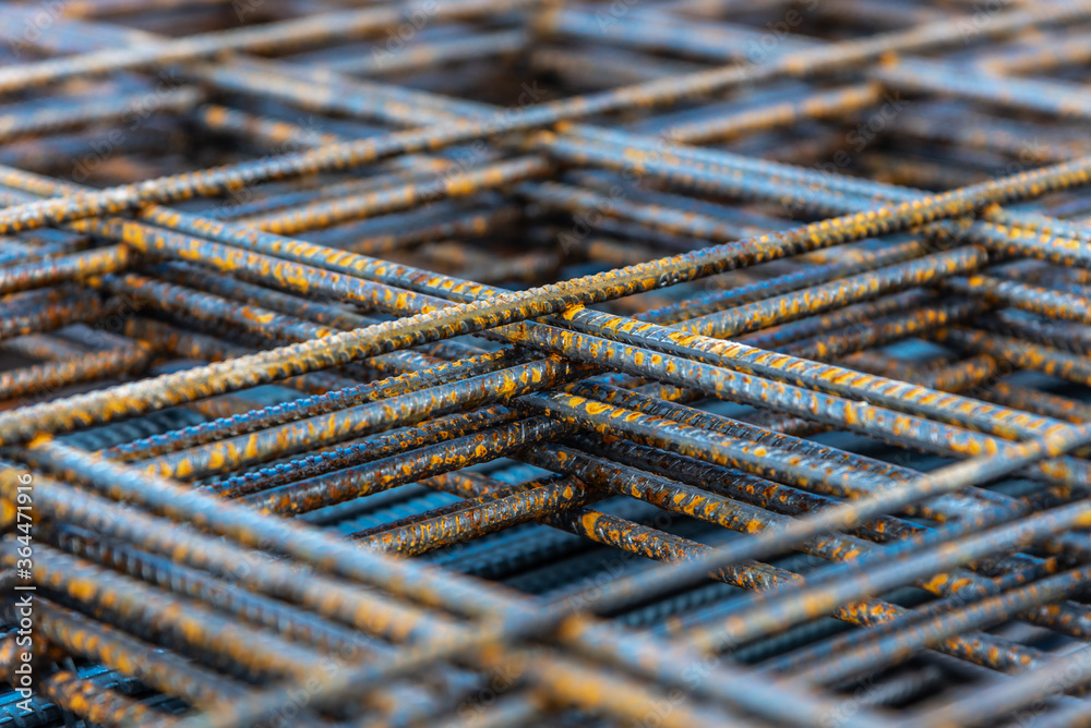 Iron reinforcing bar also known as rebar is stacked ready to be used in ...