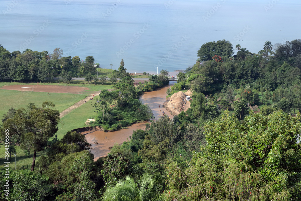 Mouth of Sebeya river in Lake Kivu (Rwanda); people are digging sand ...