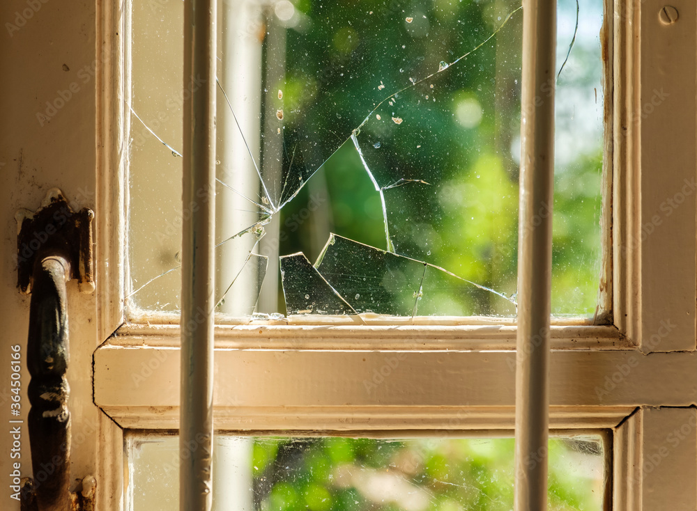 Broken Glass House Window