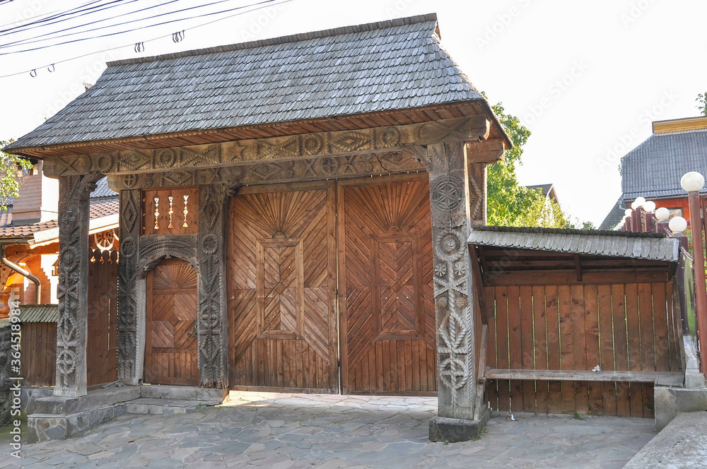 DESESTI, MARAMURES, ROMANIA, SUMMER 2018. Beautiful wooden doors on the ...