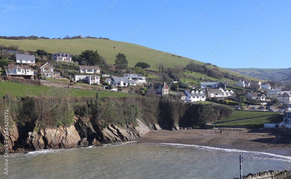 Clifftop houses in the coastal village of Coombe Martin in Devon ...