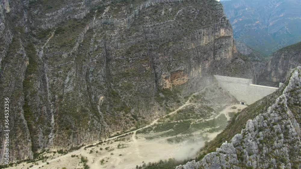 Dry river bed and big dam of hydro-power built on valley of La Huasteca ...