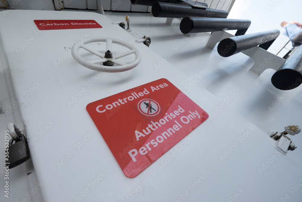 Carbon Dioxide and Authorised Personel only warning signs on a ship ...