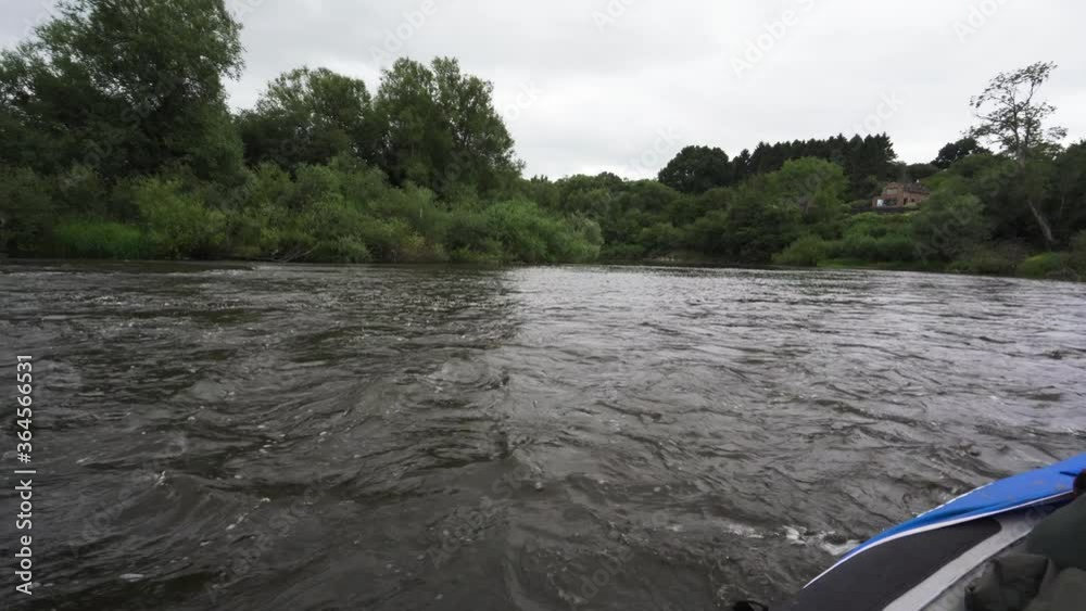 The view from a kayak on fast-moving choppy river water Stock Video ...