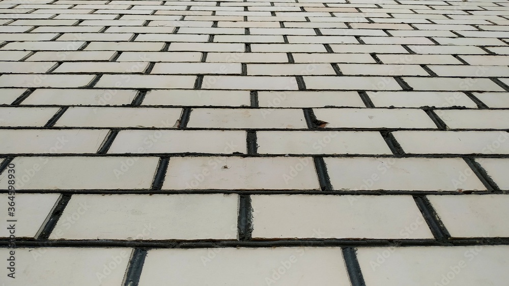wall of pale yellow brick. bottom view. brick texture Stock Photo ...