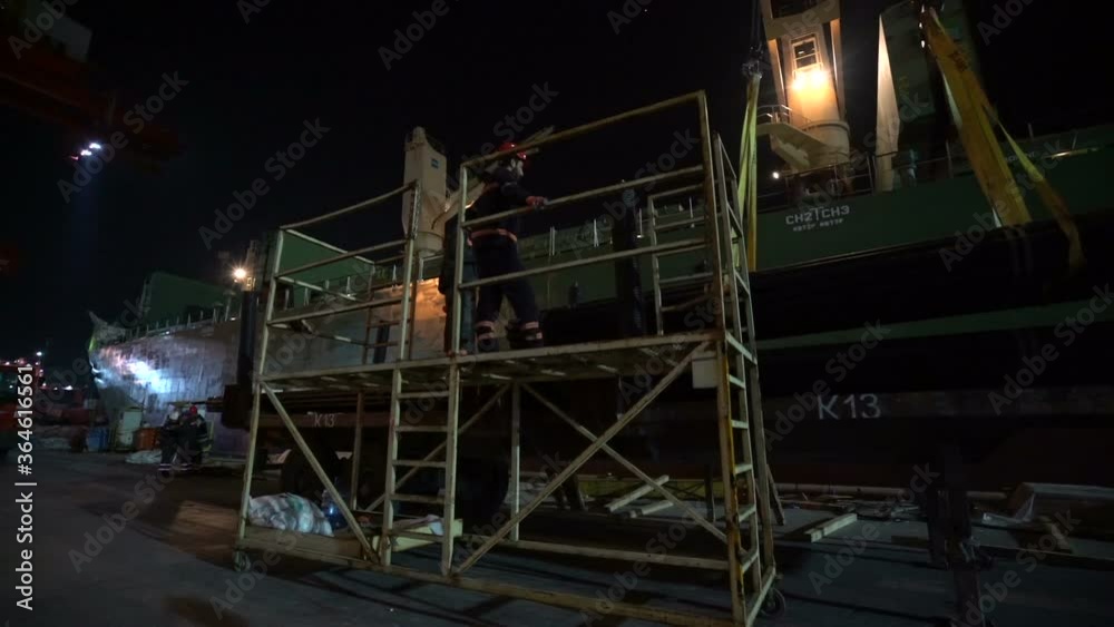 Commercial Sea Port. Stalls with metal pipes on the quay of the port ...