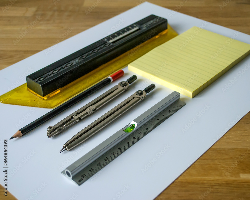 Measuring instruments and tools insulated on a white sheet. Set of ...