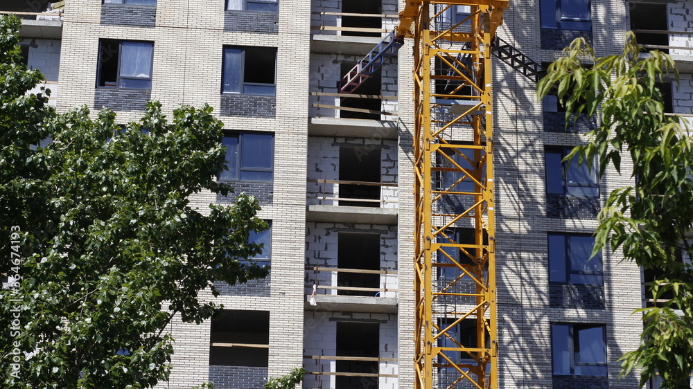 The construction of a new multi-storey building. Construction of a new ...