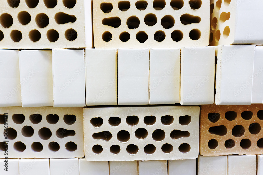 White bricks with a round hole. Close-up. Trade in building materials ...